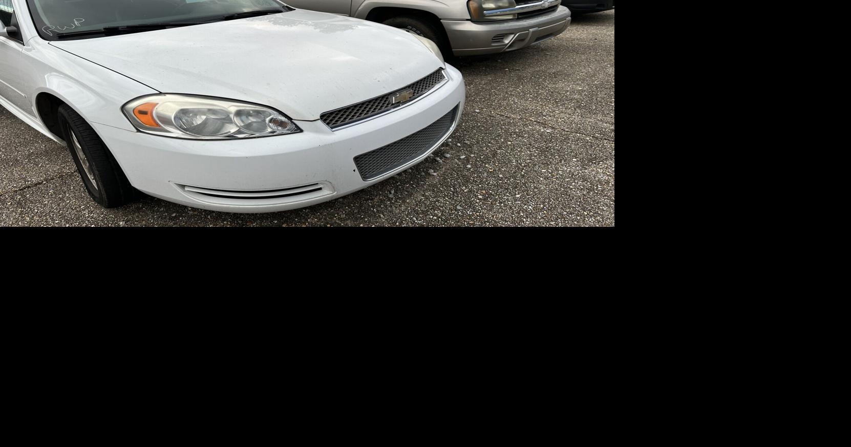 State surplus auction features vehicles, furniture … and boxes full of ...