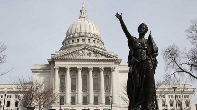 Protesters pull down Lady Forward statue, Col. Hans Christian Heg ...