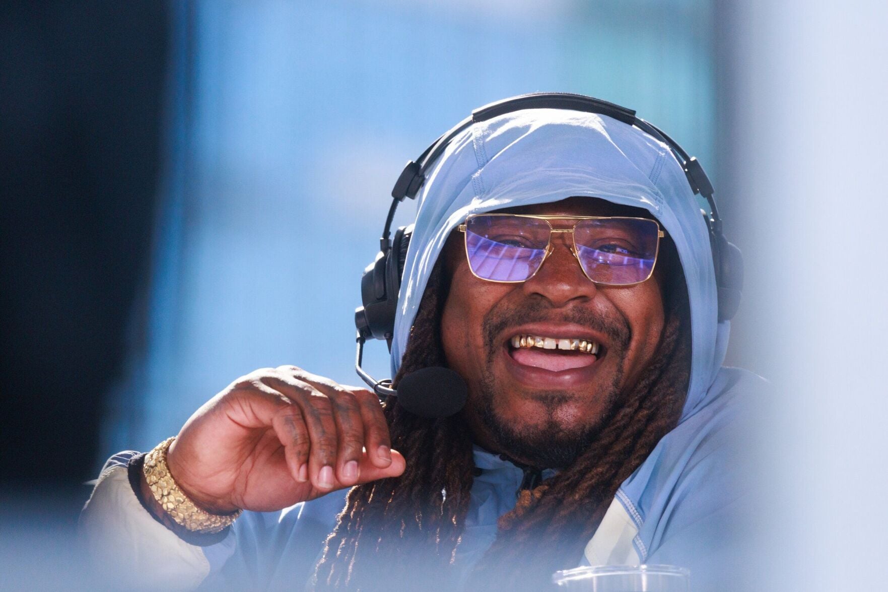 Ex-Seahawk Marshawn Lynch helps energize ‘Men in Blazers’ crowd ...