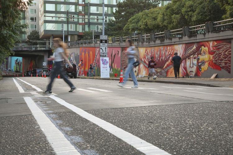 Ten artists paint Seattle murals representing migration and belonging ...