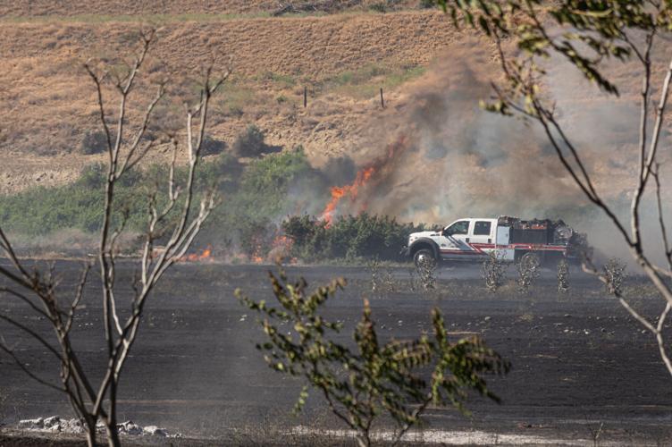 Lawn mower sparks wildfire that prompts evacuations in East Valley ...
