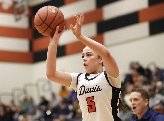 Davis girls roll to district title for Akil White's 100th win as a ...