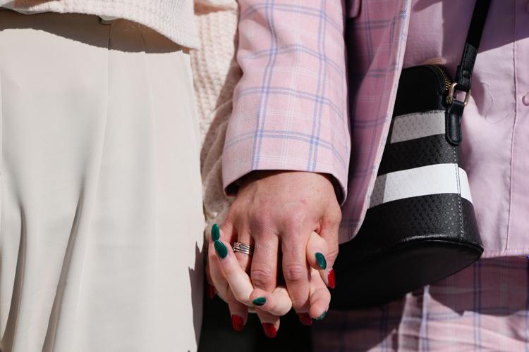 Photos of demonstrators outside the Supreme Court as it considers ...