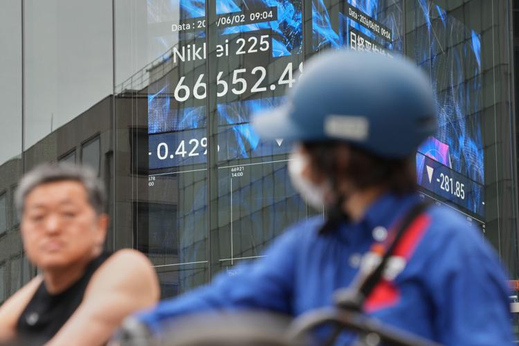Wall Street's record-breaking rally slows as Alphabet drags on the ...
