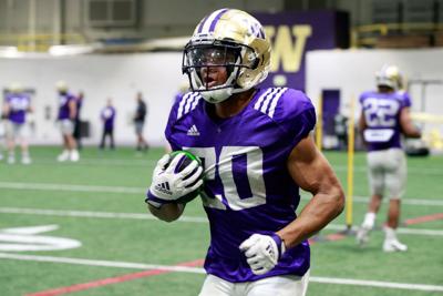 UW running back kept playing while under investigation for alleged ...