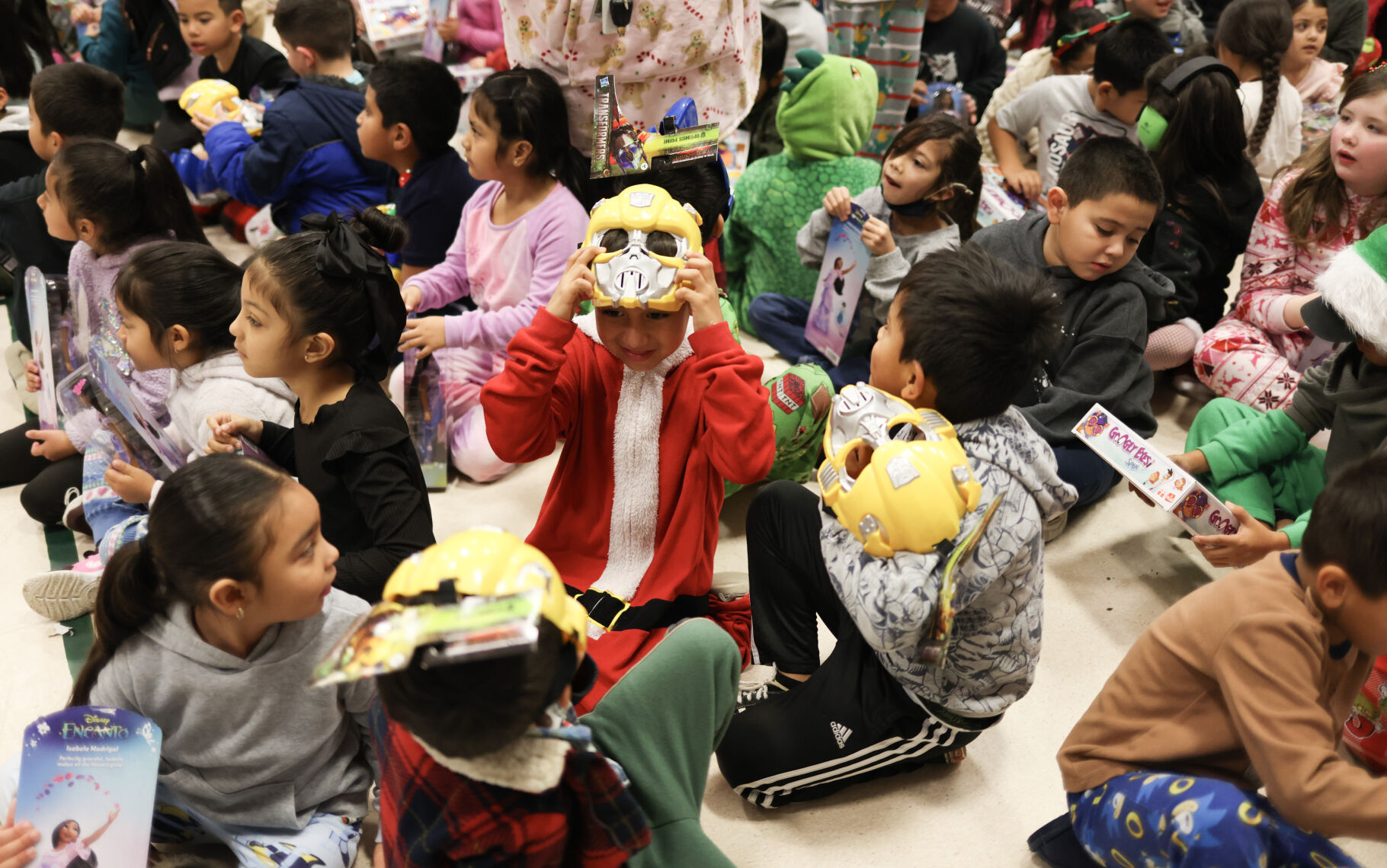 'Blue Santa' project gifts a toy to every student at Garfield ...