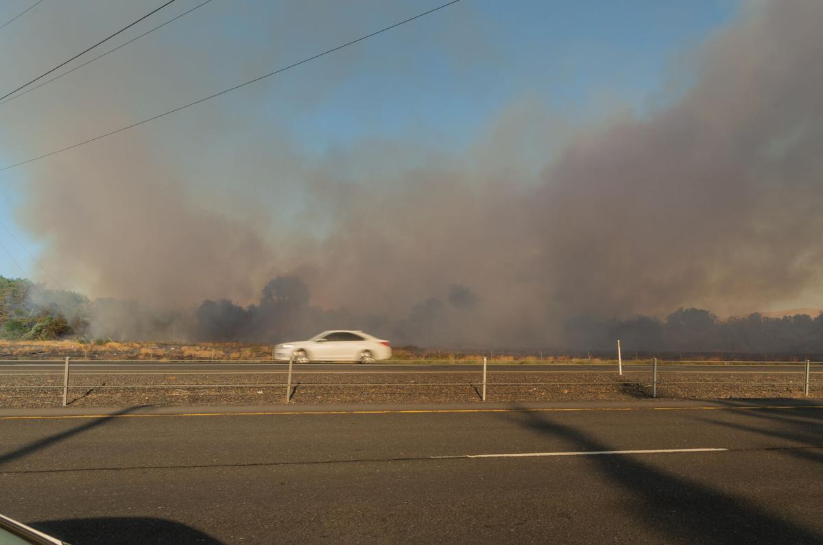 Yakima firefighters continuing to monitor wildfire off Interstate 82 in ...