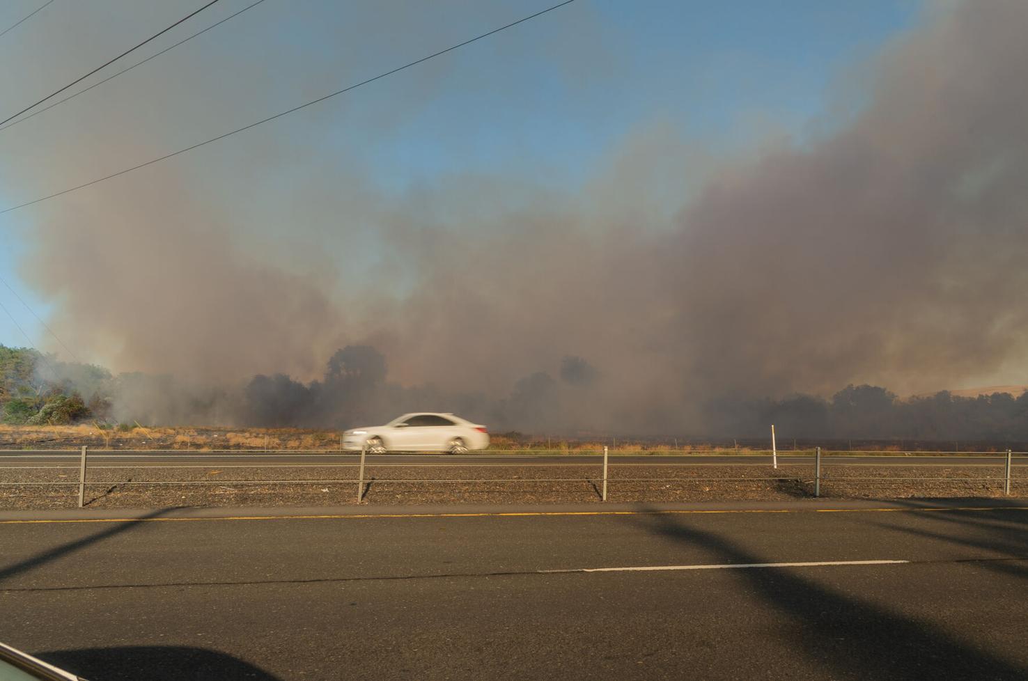 Yakima firefighters continuing to monitor wildfire off Interstate 82 in ...