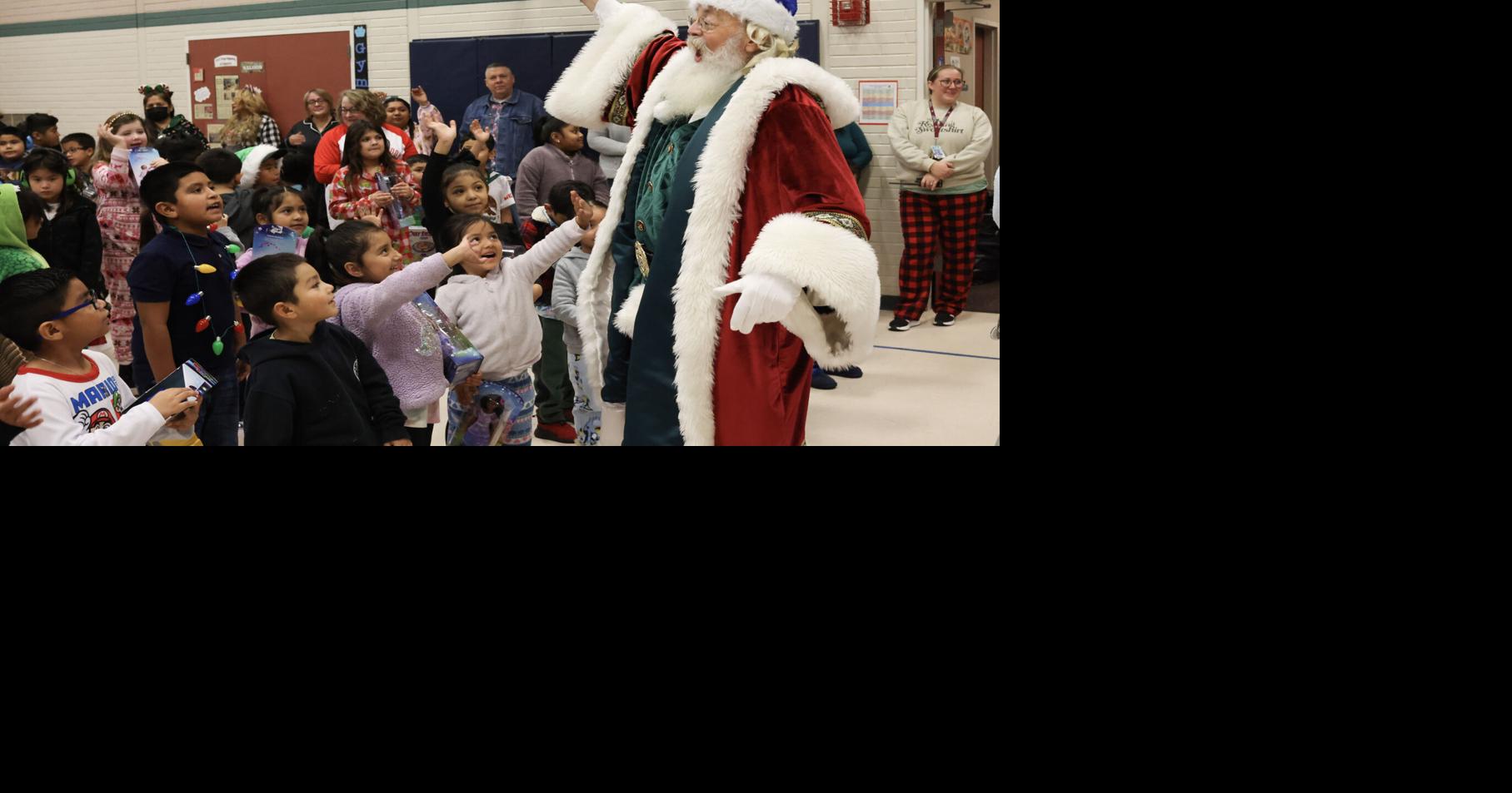 'Blue Santa' project gifts a toy to every student at Garfield ...