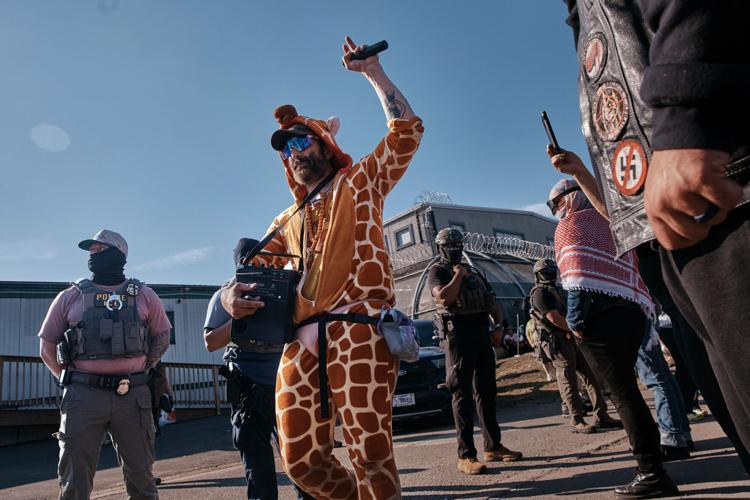 Protesters clash with law enforcement outside a New Jersey detention ...