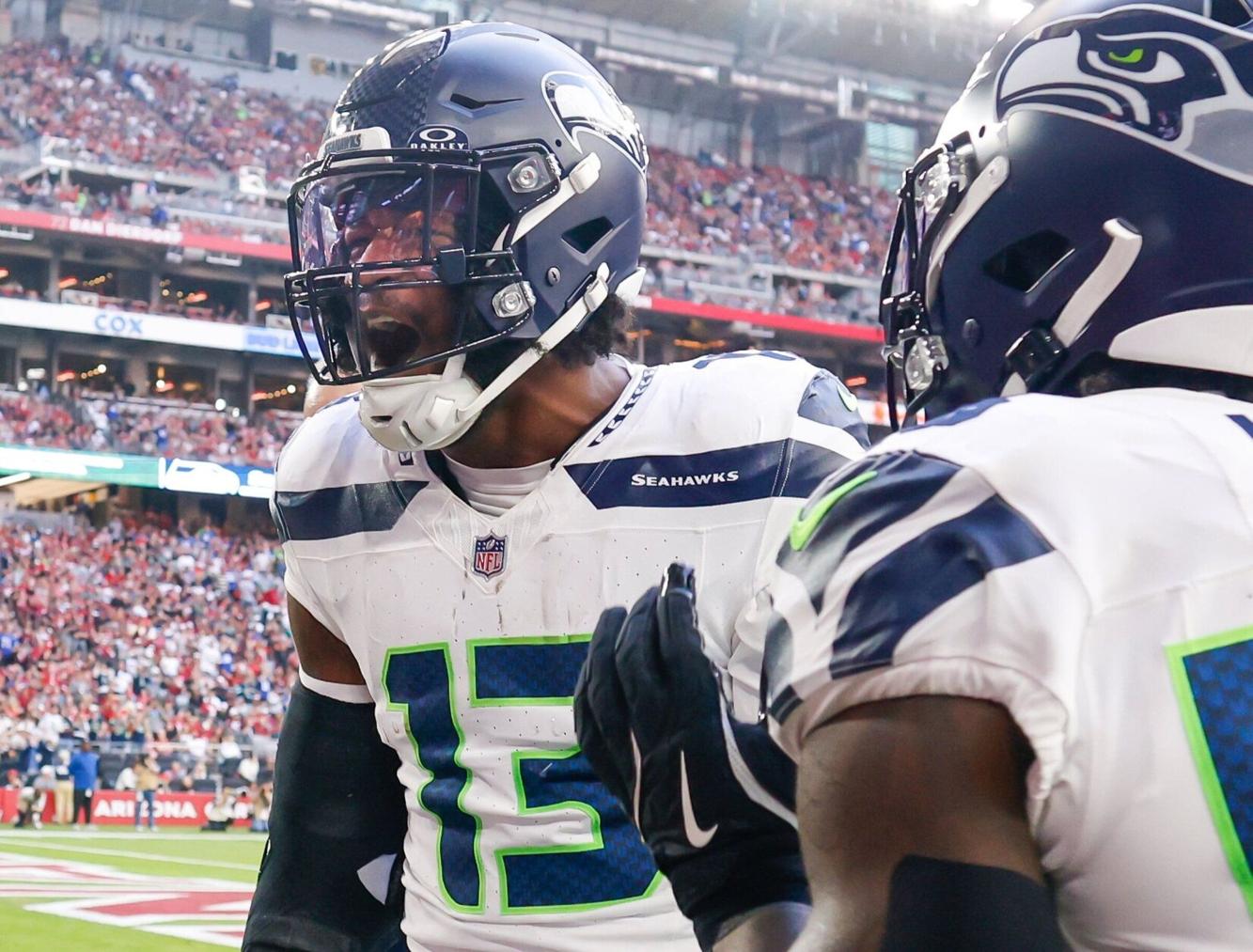 Seahawks bring back key piece, agree to three-year deal with LB Ernest ...