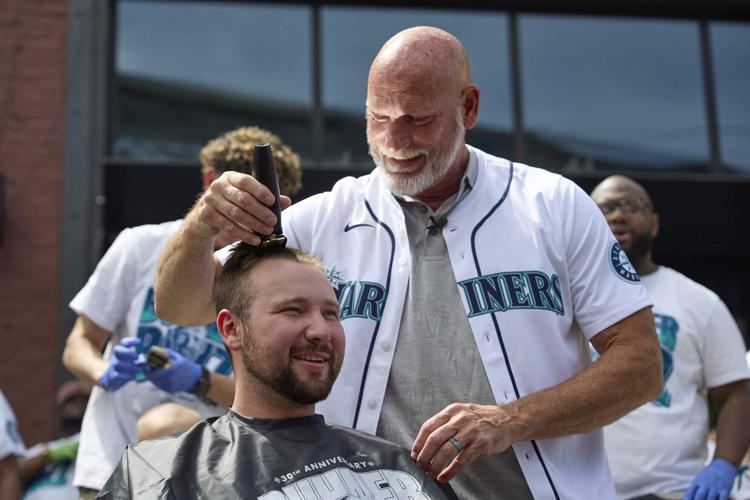 Mariners fans — and Cal Raleigh — go bald to celebrate revamped Buhner ...