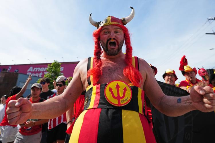 World Cup fans flood stadiums and fan zones with dazzling costumes ...