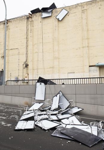 High winds topple trees, cause power outages; Solar panels blow off ...