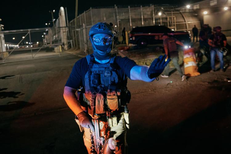 Protesters clash with law enforcement outside a New Jersey detention ...