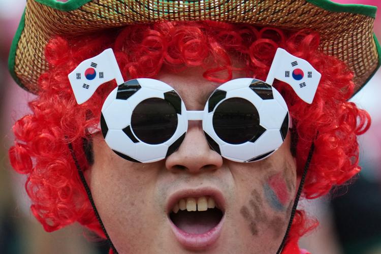 World Cup fans flood stadiums and fan zones with dazzling costumes ...