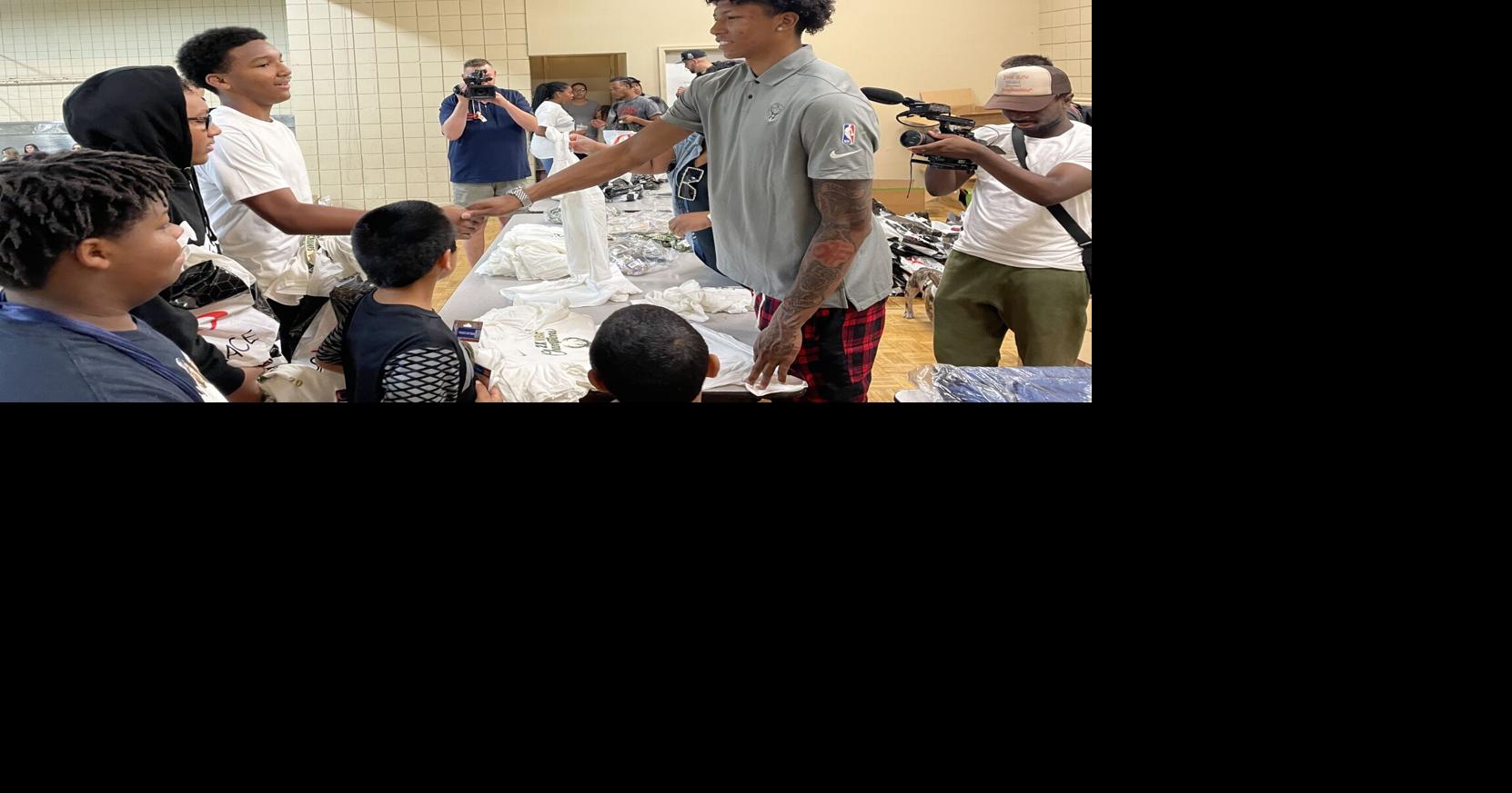 Beauchamp returns to give out shirts, backpacks, school supplies ...