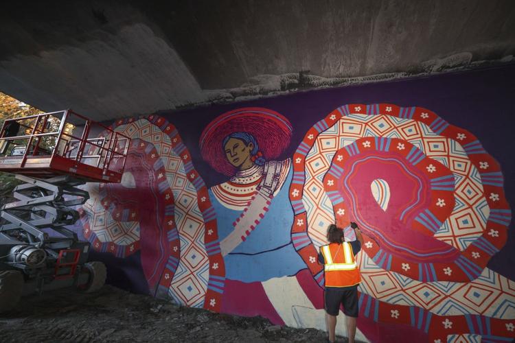 Ten artists paint Seattle murals representing migration and belonging ...