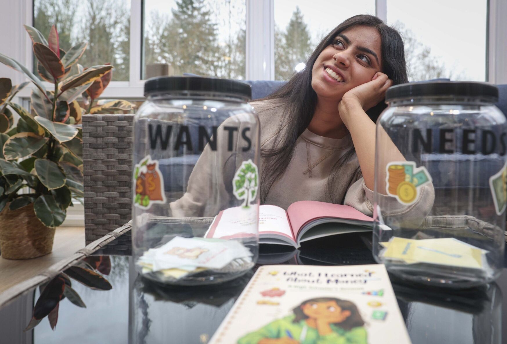 Washington student teaches kids about how to manage their money ...