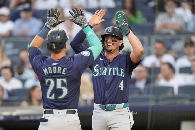 Dylan Moore homers twice, Bryan Woo baffles Yankees hitters in Mariners ...