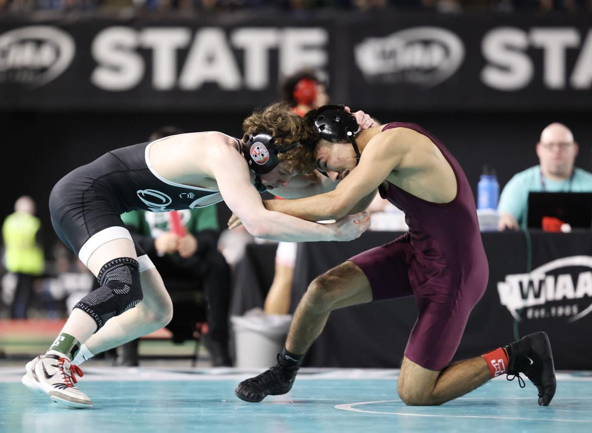 PHOTOS: Wrestlers compete in championship matches at Mat Classic XXXVII ...