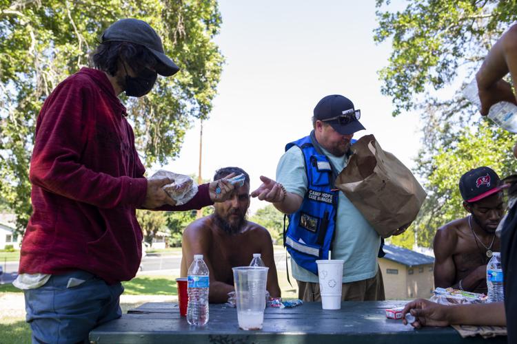 'The heat makes everything worse:' Groups reach out to help those ...