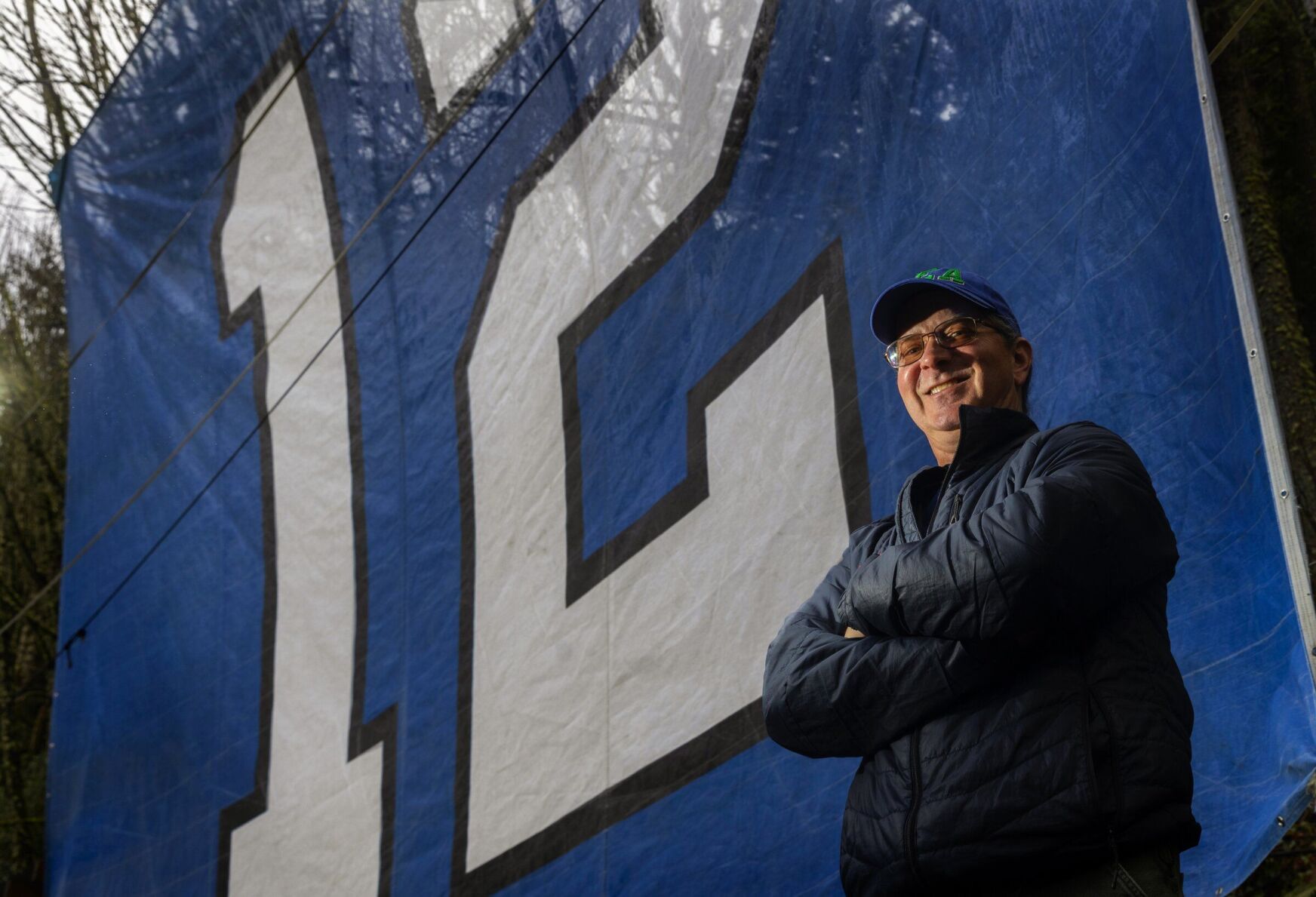 The story behind the giant, and beloved, Seahawks ‘12’ flag over I-90 ...