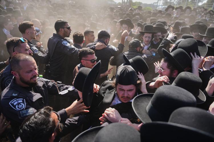 Photos of ultra-Orthodox Jews protesting military conscription in ...