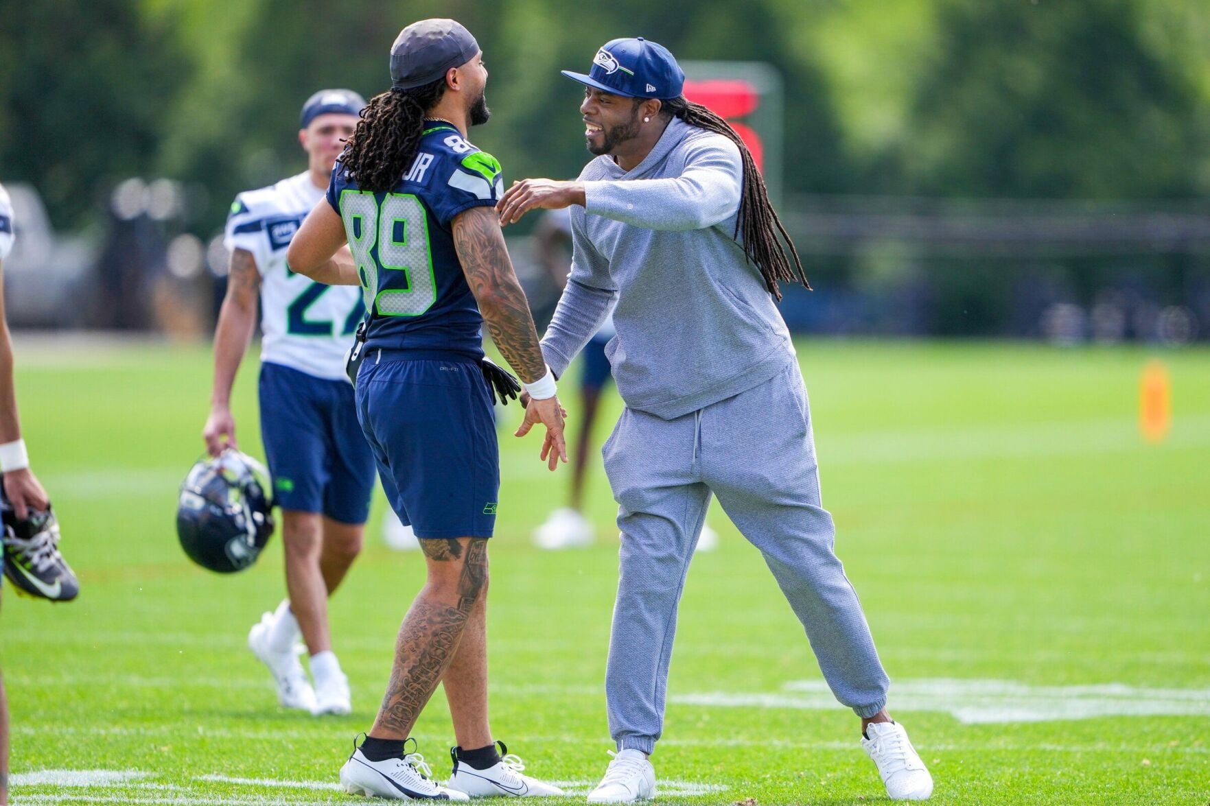 Former Seahawk Richard Sherman greets rookies on first day of minicamp ...