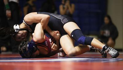 Wrestling roundup: Pham leads Pirates to victory at Davis Girls Invite ...