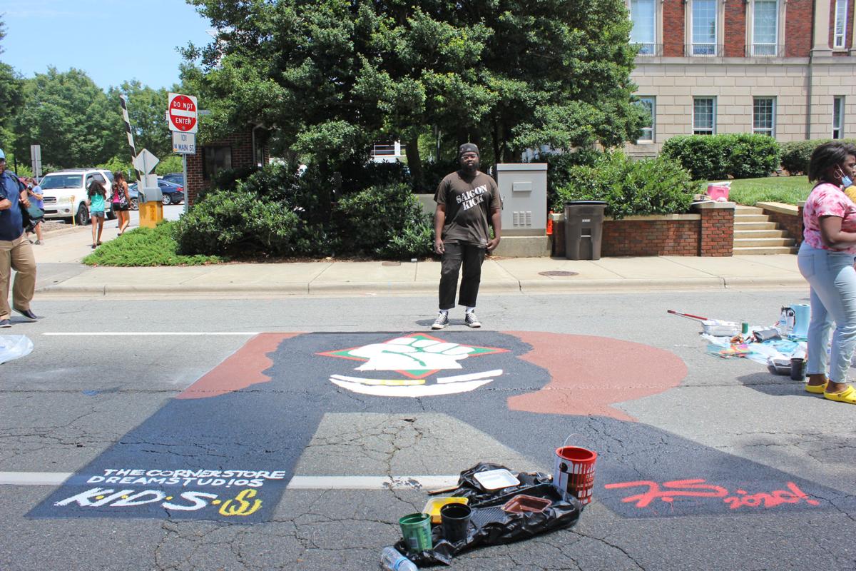 Promoting unity while demanding change through public art | News ...