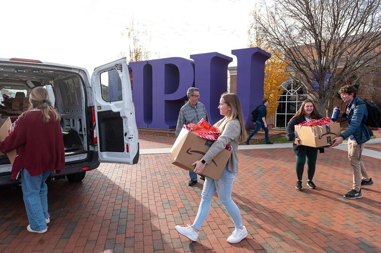 HPU Students Stuff 1,000 Stockings for Salvation Army | Education ...