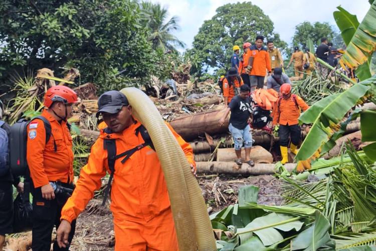 Flash floods in Indonesia kill at least 16 people and sweep away homes ...