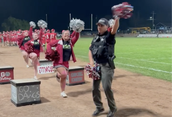 Local deputy joins daughter's cheer squad during Friday's football game ...