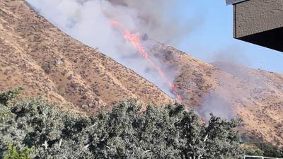 Buildings burned, hundreds of homes under evacuation as Red Apple Fire ...