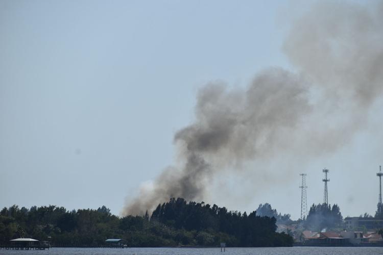 Firefighters battle blaze at Emerald Pointe in Punta Gorda; boat on ...
