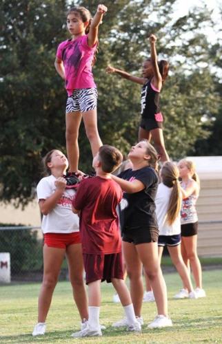 Mustangs cheerleaders reach new heights | News Archives | yoursun.com