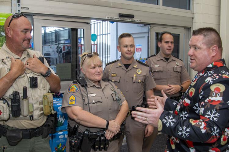 'Shop with a Cop' pairs kids with law enforcement for holiday gift ...