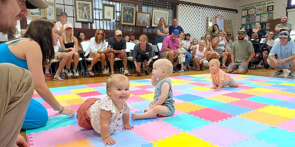 Crawling to victory: Girls win the 2025 Diaper Derby race | News ...