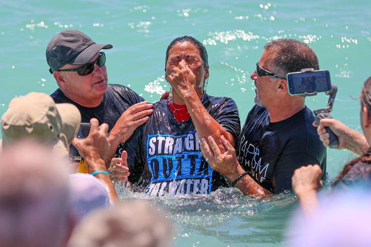 Being baptized in the Gulf of Mexico | News | yoursun.com