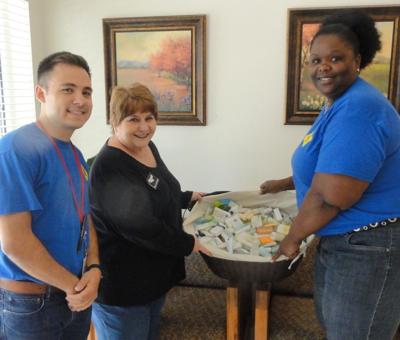 Mosaic employees help Youth Shelter | Newsarchives | yoursun.com