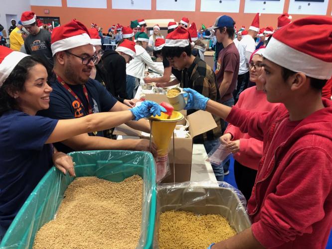 Rotarians, volunteers bag 169,000 meals for those in need | News ...
