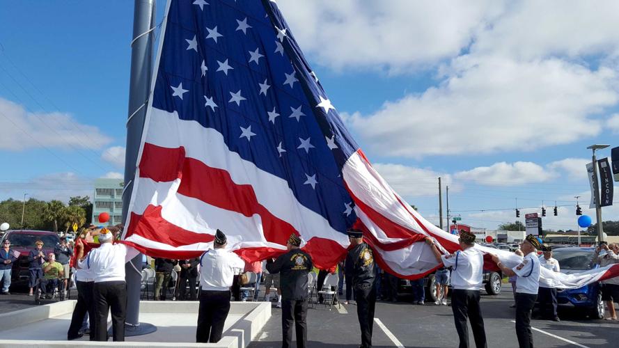 County's largest flag raised at Alan Jay Ford | News | yoursun.com