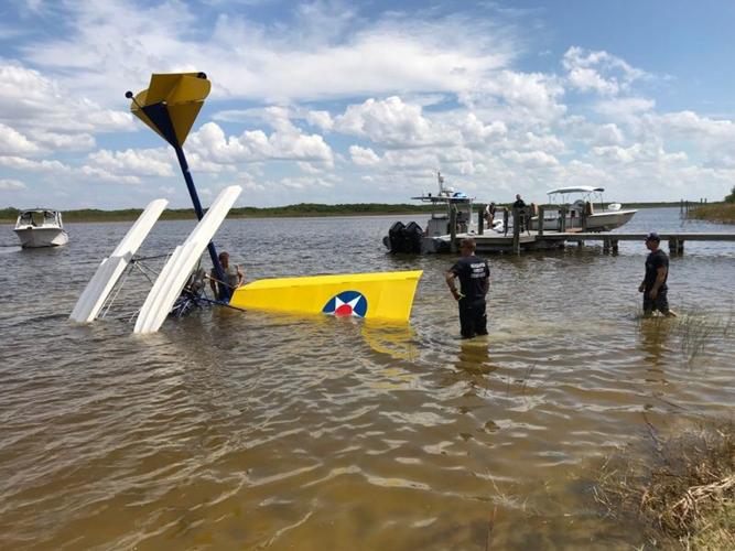 Pontoon ultralight plane flips in lagoon, pilot is OK | The Daily Sun ...