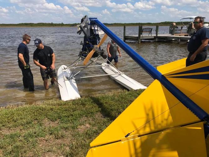 Pontoon ultralight plane flips in lagoon, pilot is OK | The Daily Sun ...