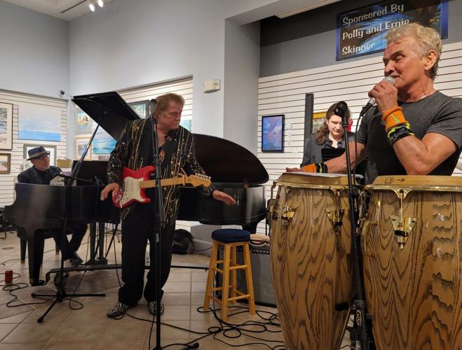 A black concert grand piano begat a phat blues band | News | yoursun.com