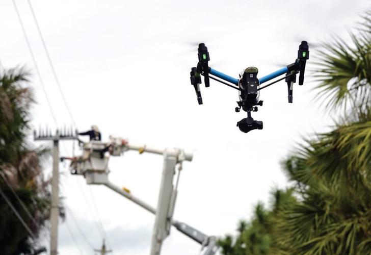 No, they're not spying on you - FPL's drones check power lines in ...