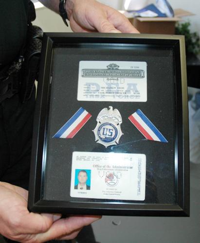 Sheriff’s deputy receives retirement credentials from DEA ...