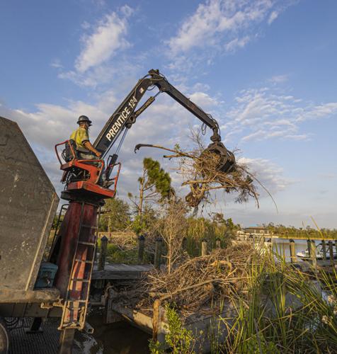 Residents voice frustration over shoaled canals, clogged waterways ...