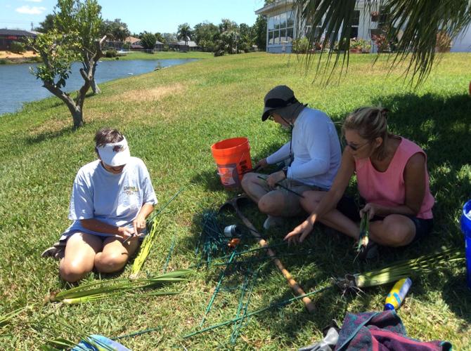 Group plants shoreline in Venice Gardens | News Archives | yoursun.com